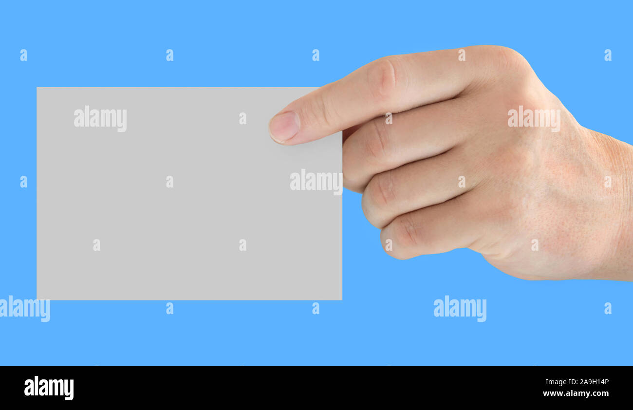 Male hand and label Stock Photo - Alamy