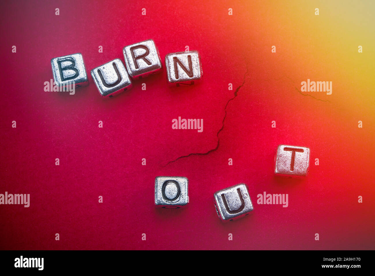 Burnout background concept represented by cubic metal letters Stock ...