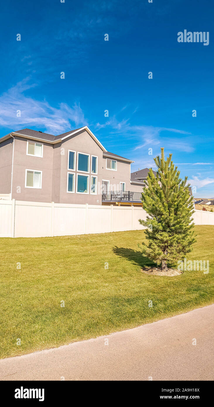 Vertical frame Modern housing estate with pedestrian walkway during day ...