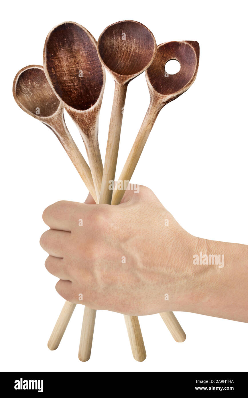 Male hand and cooking spoons isolated against white background Stock ...