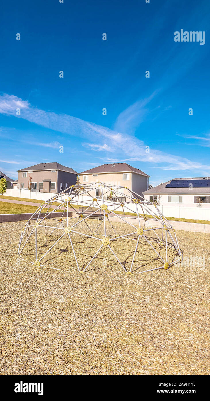 Vertical frame Urban playground for kids with climbing dome Stock Photo ...