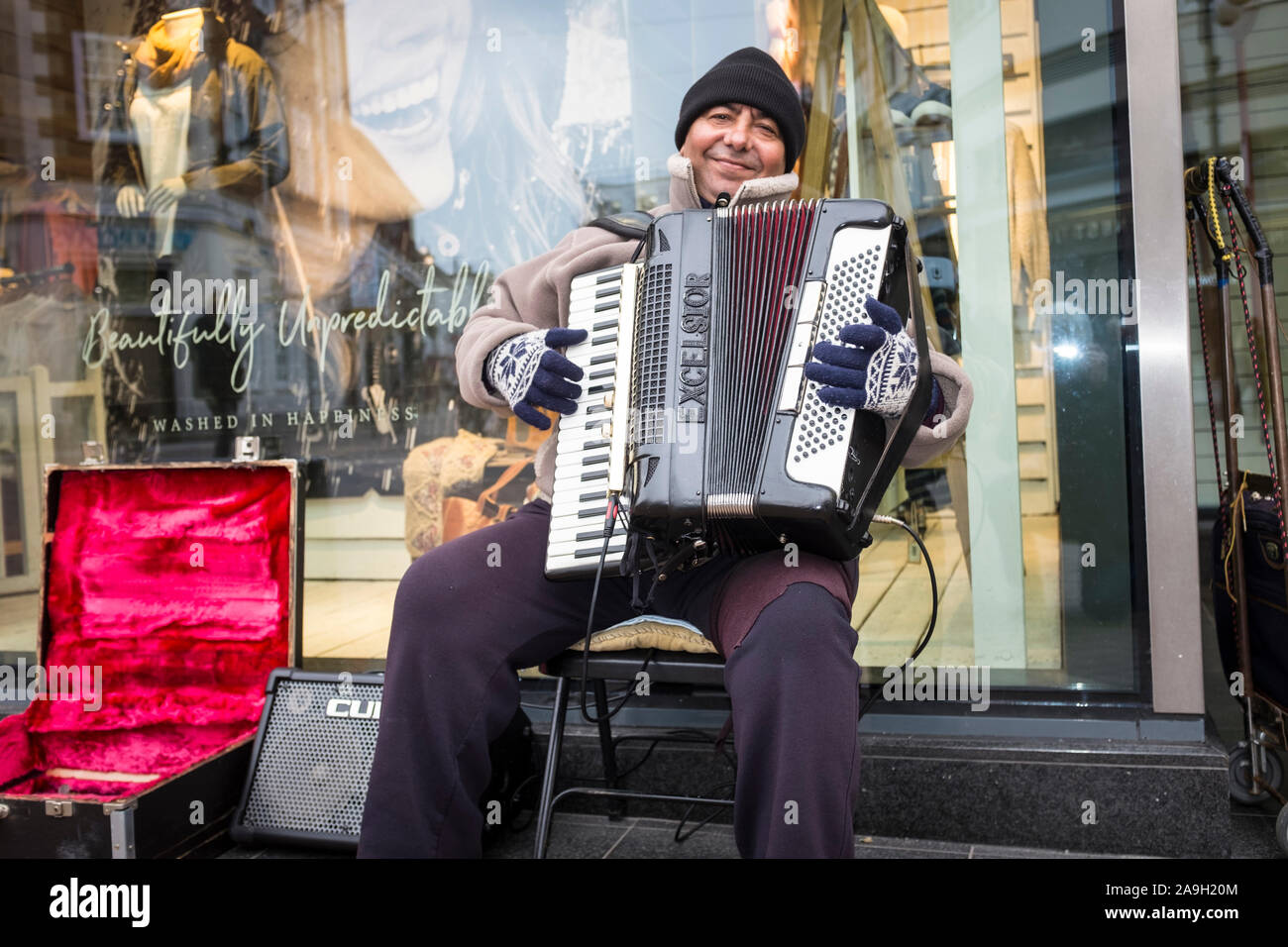 Busker busking playing the accordion hi-res stock photography and ...