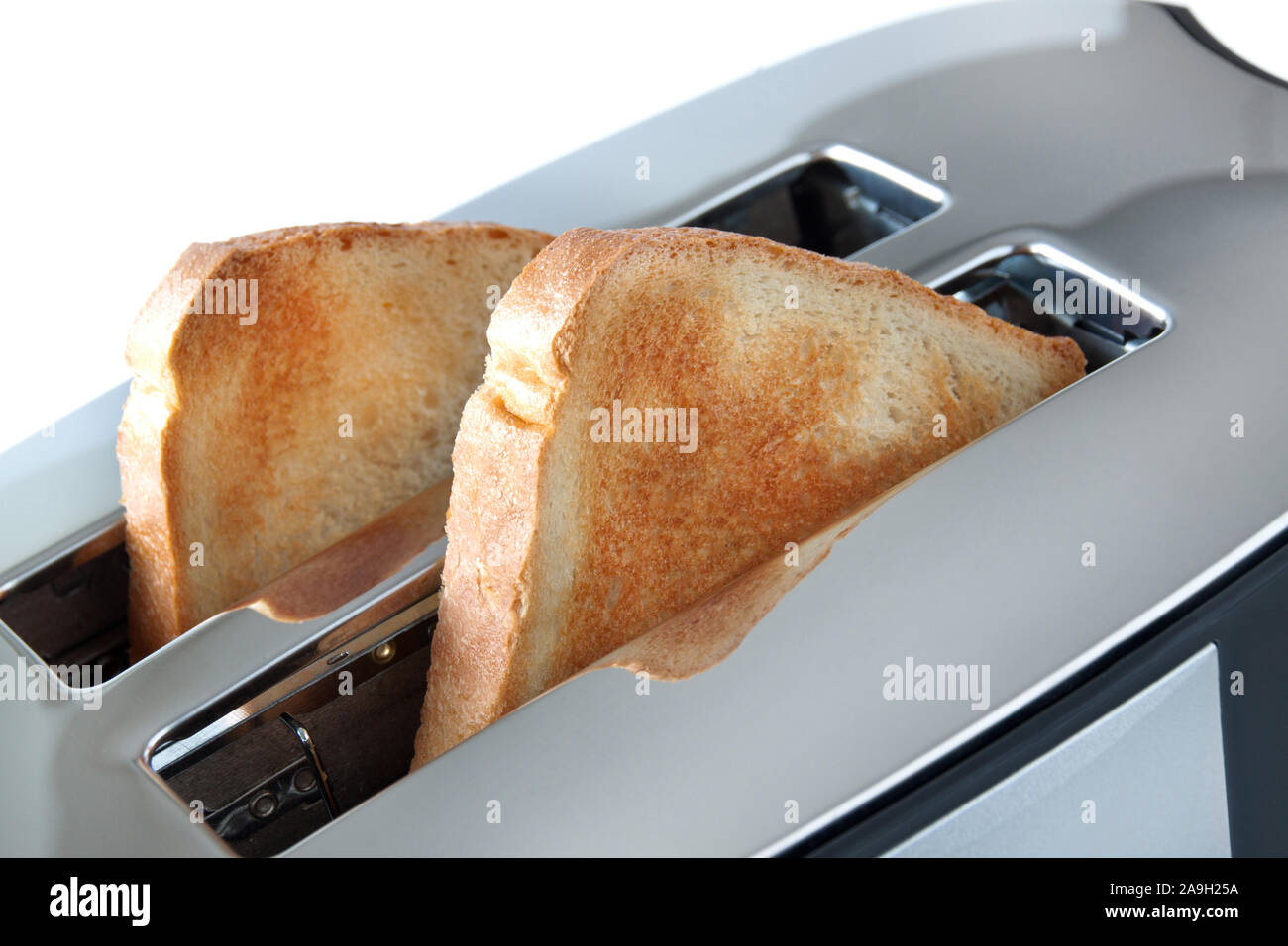 Toaster and two slices of bread Stock Photo - Alamy