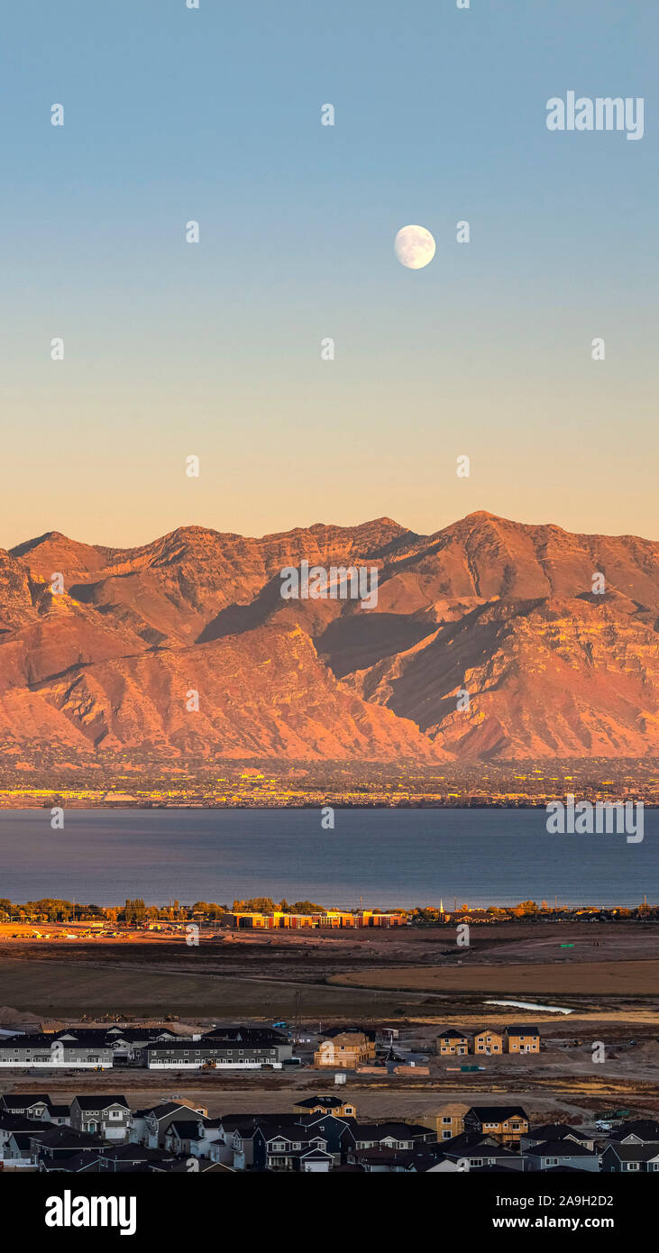 Vertical Moon rising over Provo Canyon, Utah Lake Stock Photo - Alamy