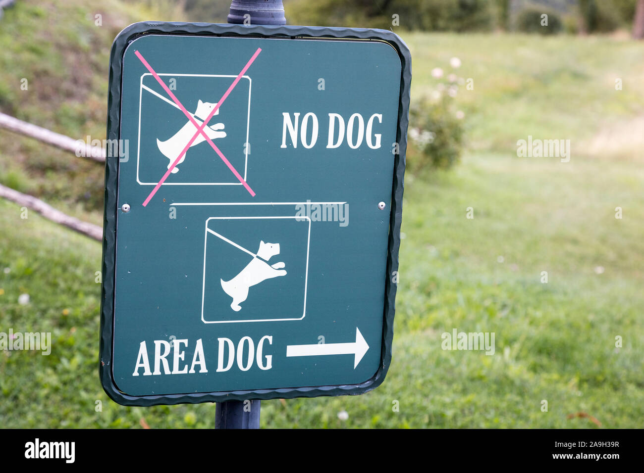 Sign advising hotel guests of the areas where dogs are allowed to roam ...