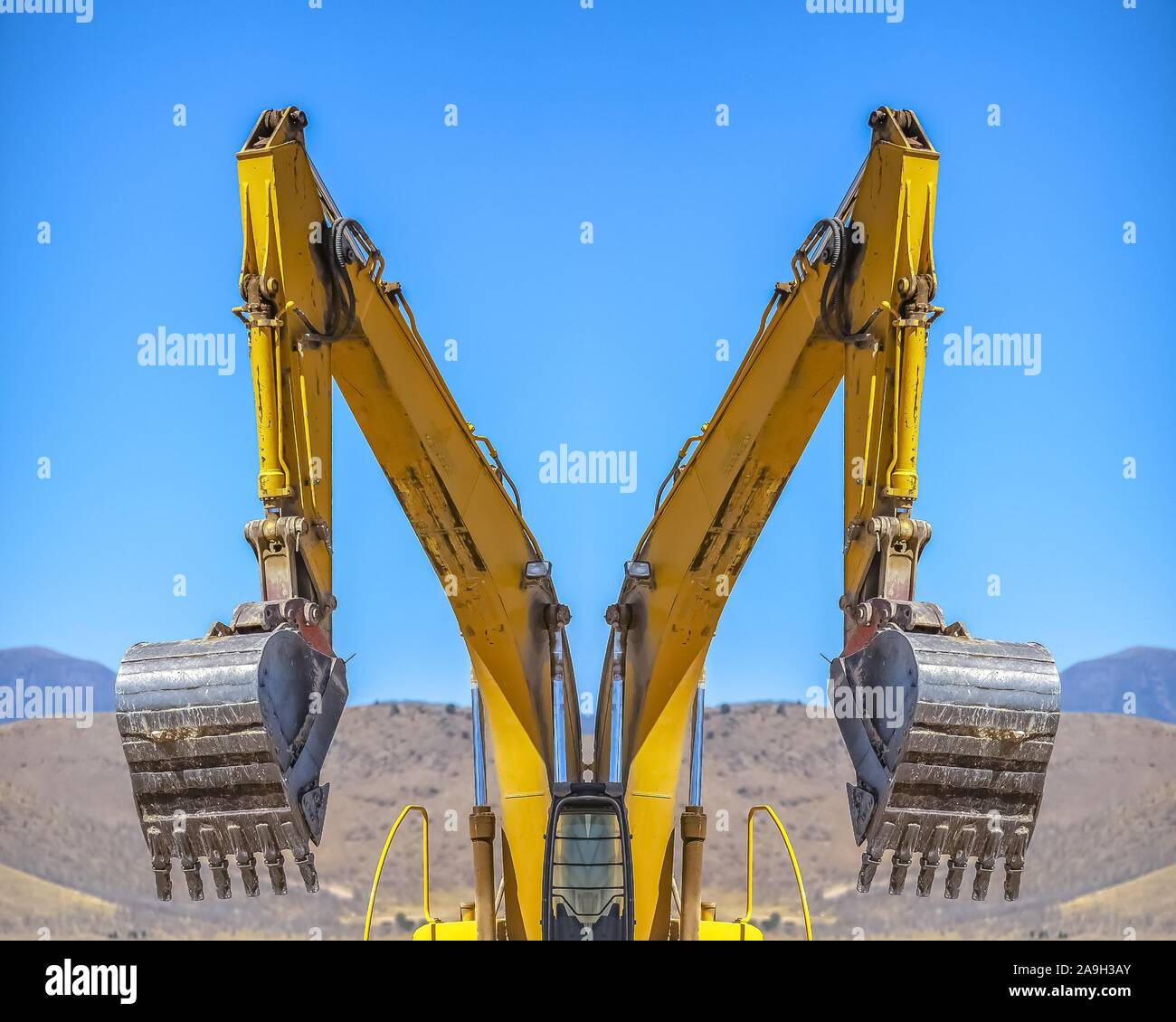 Reflection of an excavator facing away from the center of the ...