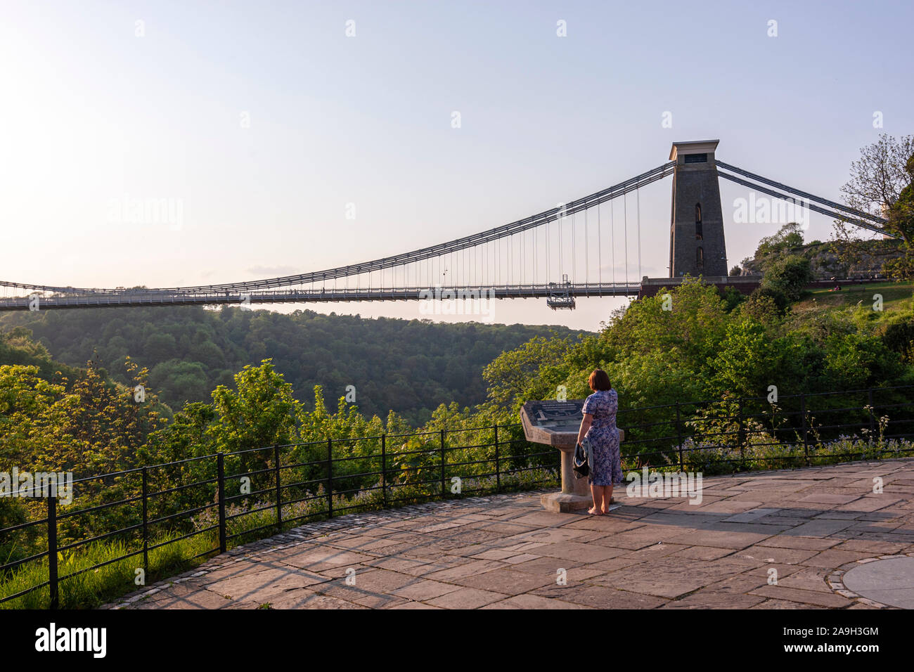 Woman reading the information about Clifton Suspension Bridge, design ...