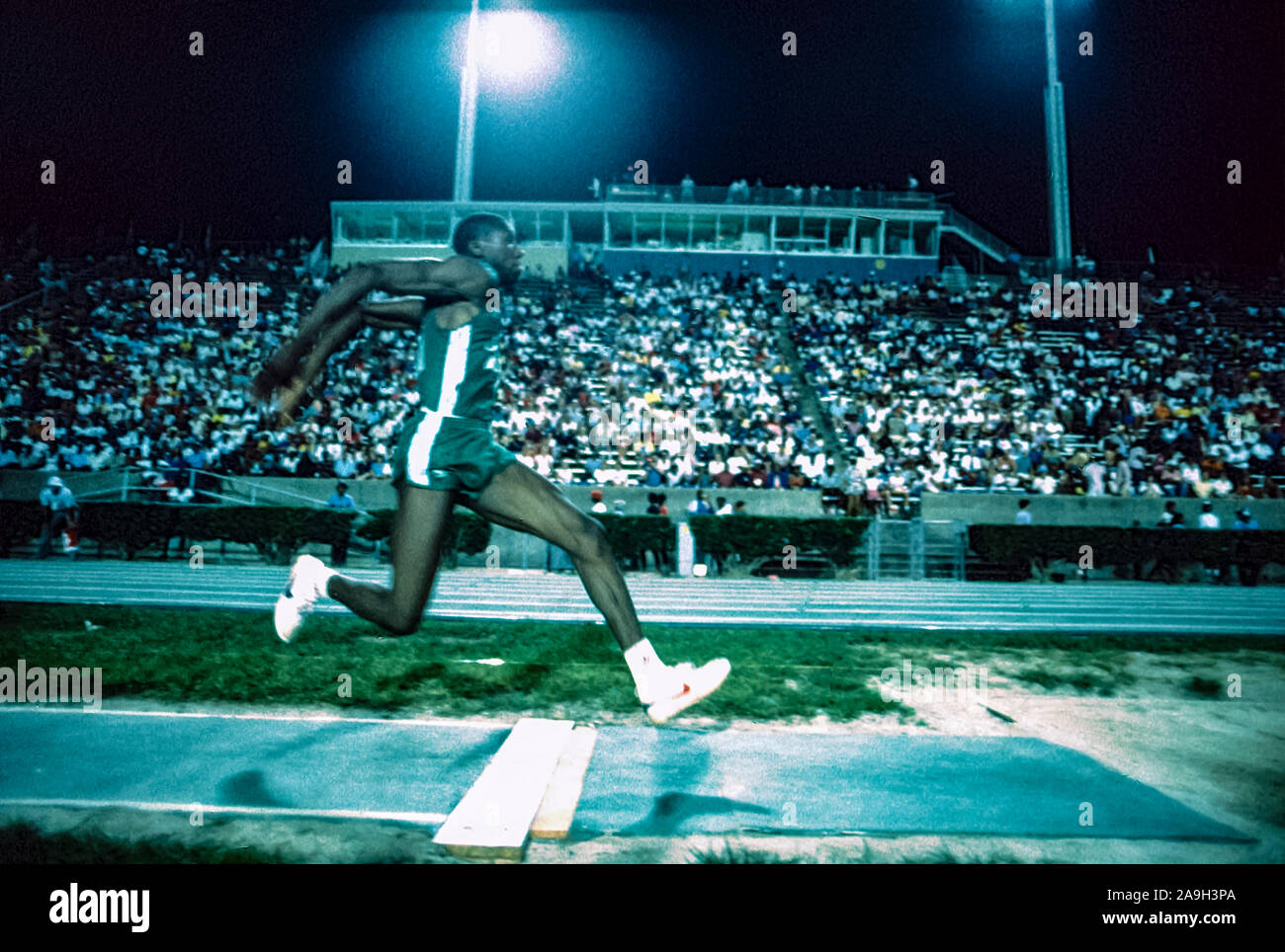 Al Joyner (USA) competing at the 1985 National Sports Festival Stock ...