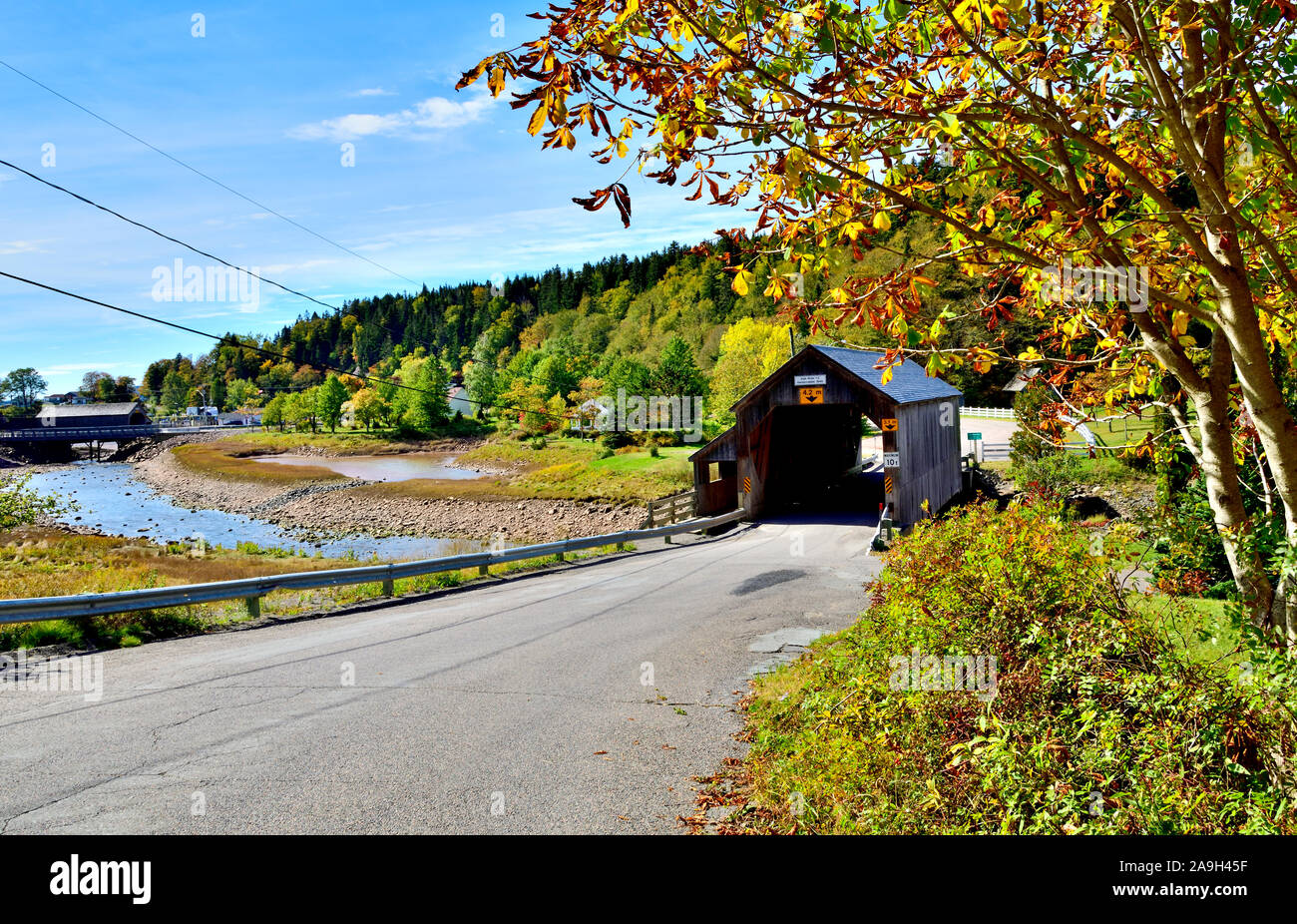 An autumn landscape view of an iconic Hardscrabble covered bridge built ...