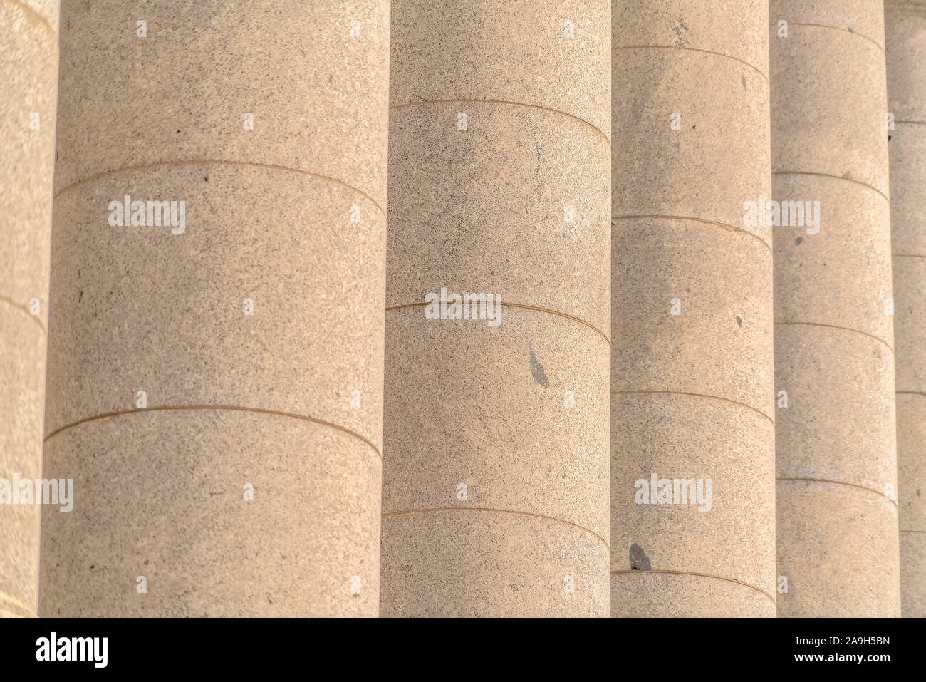 Close up of white stone columns at the facade of Utah State Capitol ...