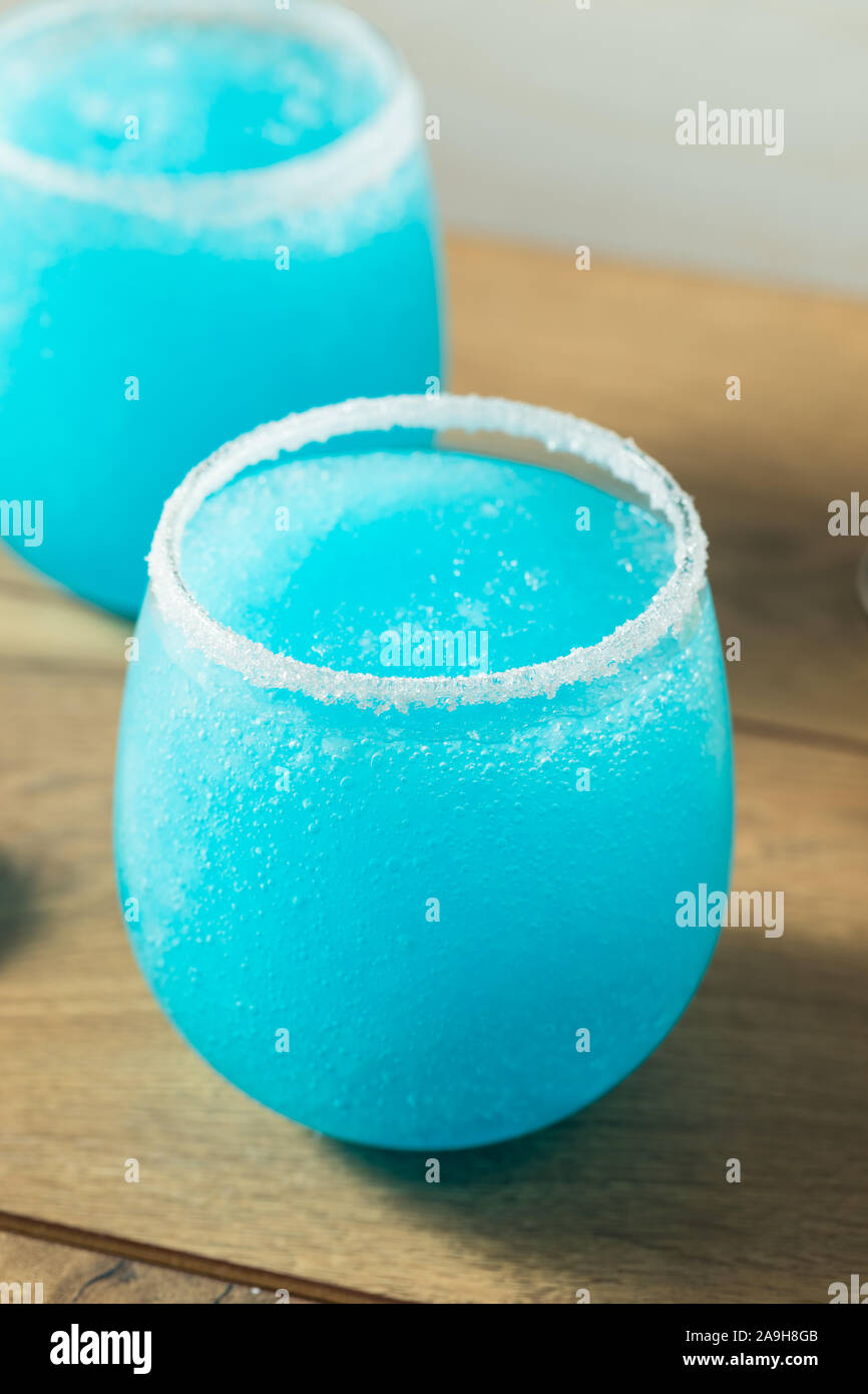 Homemade Frozen Blue Jack Frost Cocktail with Lemon and Vodka Stock ...