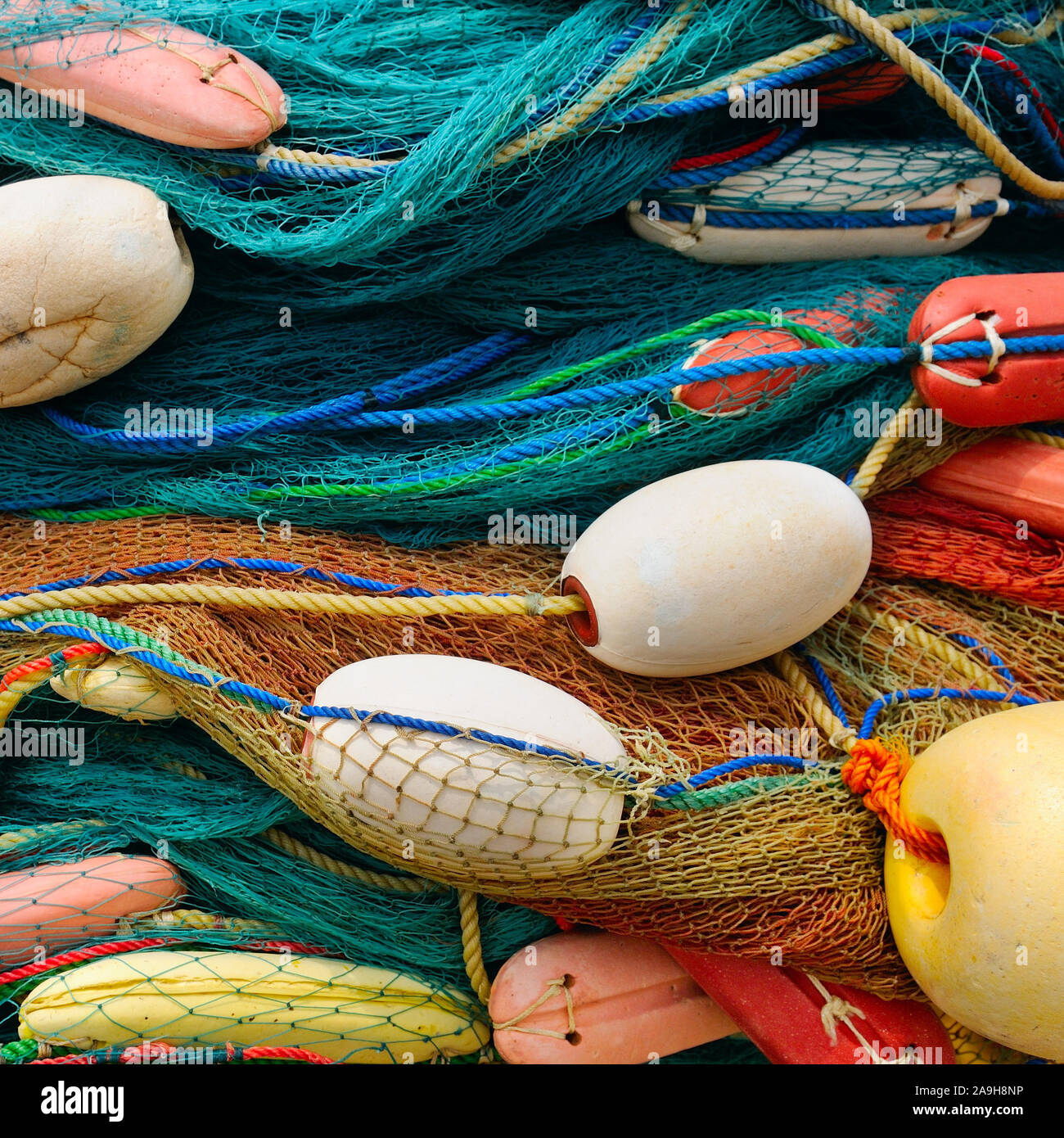 background of colorful fishing nets and floats Stock Photo - Alamy