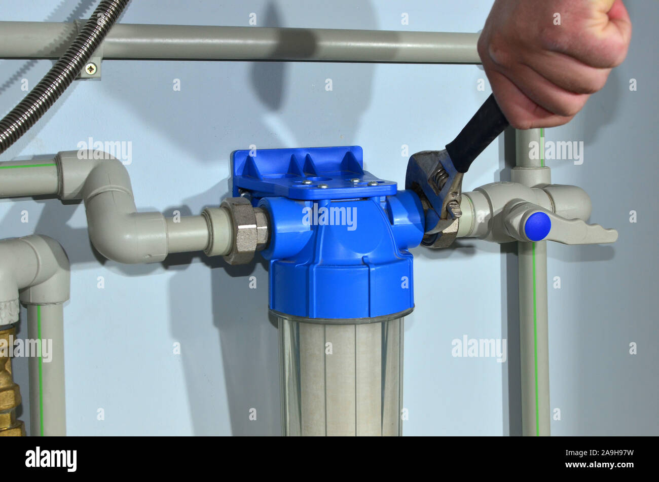 Mounting of house rainwater filter system. Borehole drilling and water ...