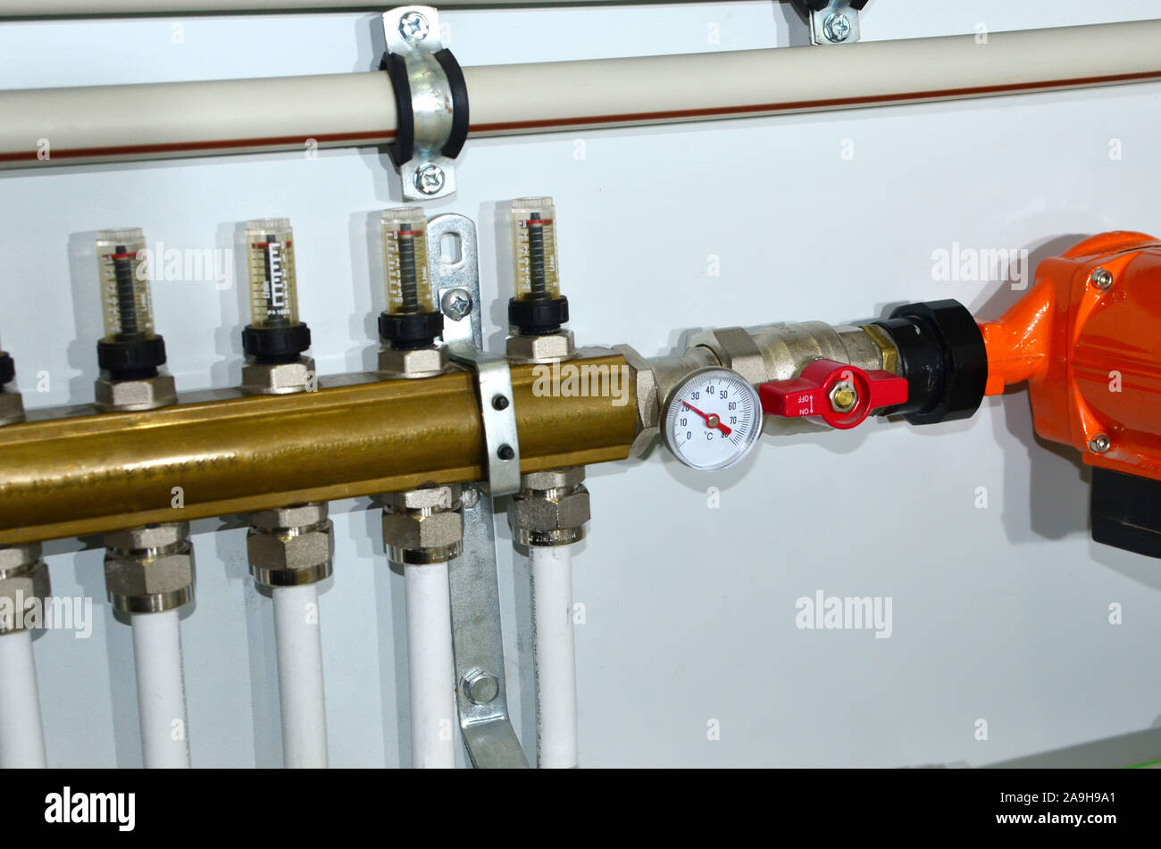 Close up of manometer, pipe, flow meter, water pumps and valves of ...