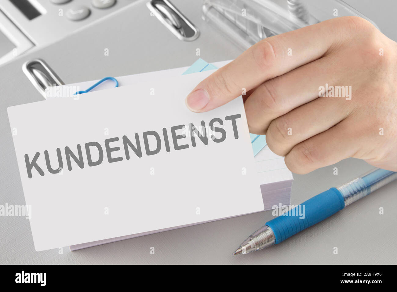 German Service sign with female hand Stock Photo - Alamy