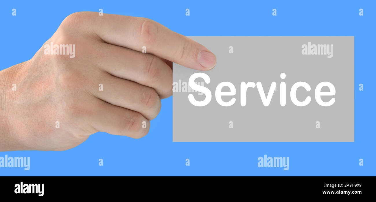 Male hand and Service label Stock Photo - Alamy