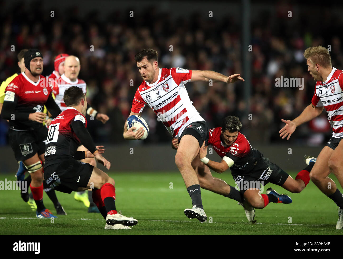 Gloucester Rugby's Mark Atkinson (centre) breaks through during the ...