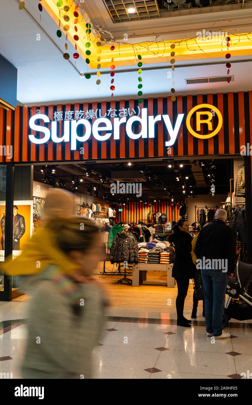 Shoppers passing the new Superdry store, shop located in the Intu ...