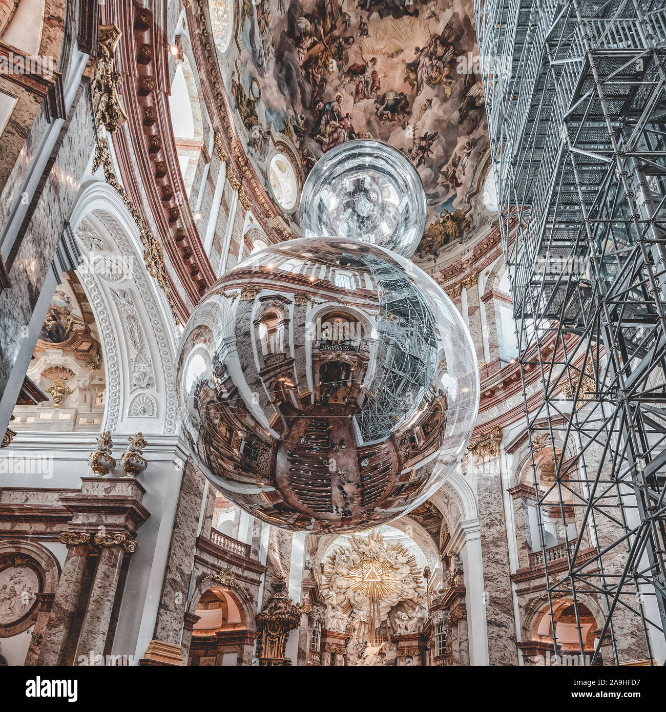 Vienna, Austria - April 28, 2019: Interior and two shining balls hang ...