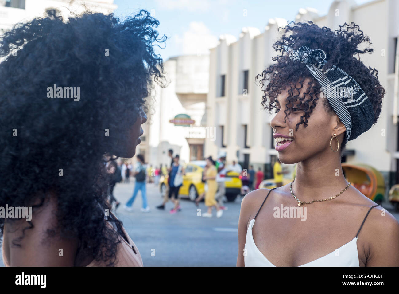 Two young Cuban women Stock Photo - Alamy