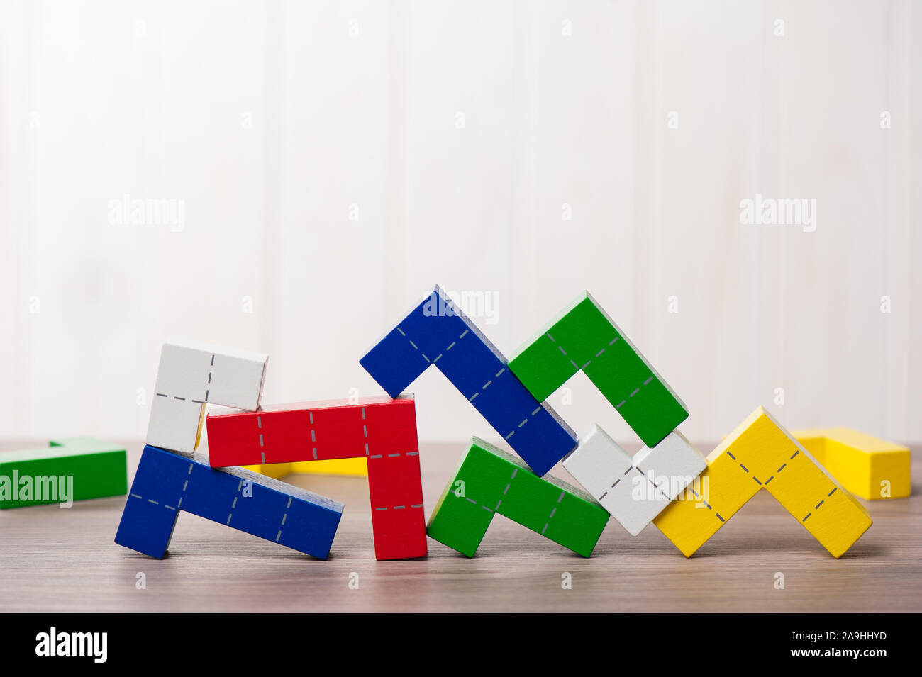 colorful wooden puzzle blocks toy, wooden construction blocks with ...