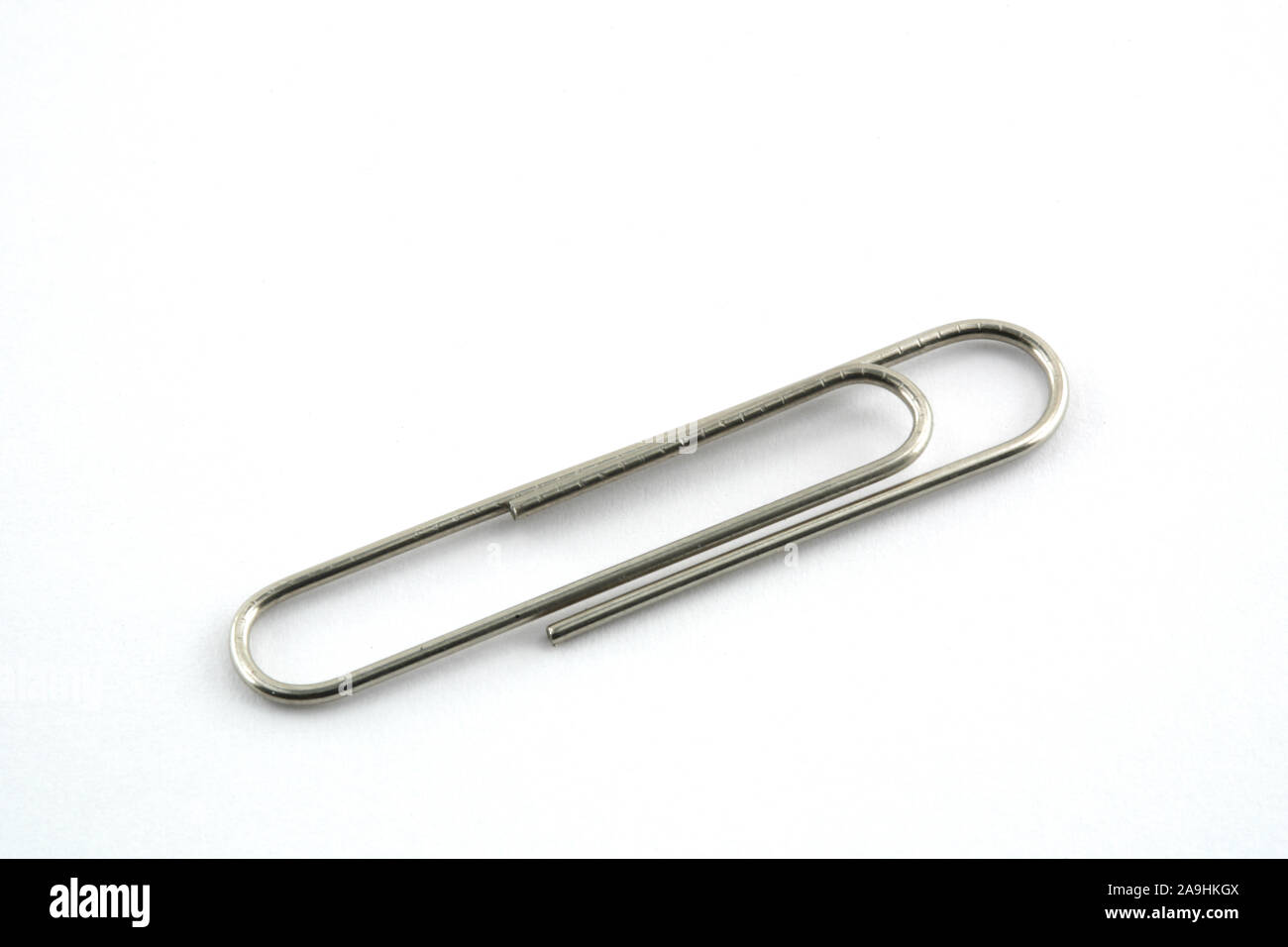 paper clip on a white background Stock Photo - Alamy