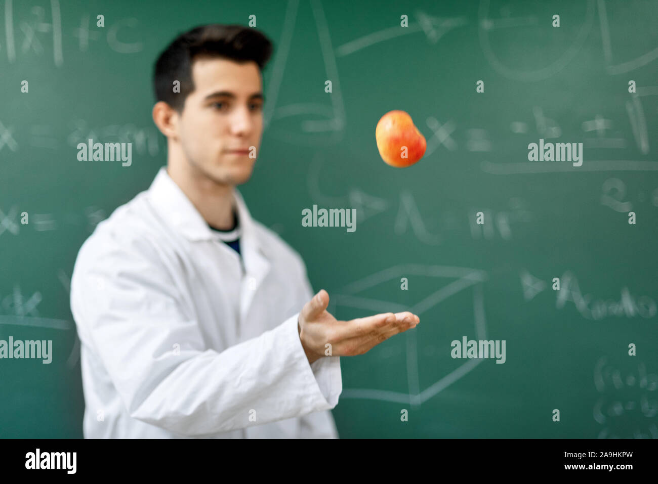 Throwing an apple hi-res stock photography and images - Alamy