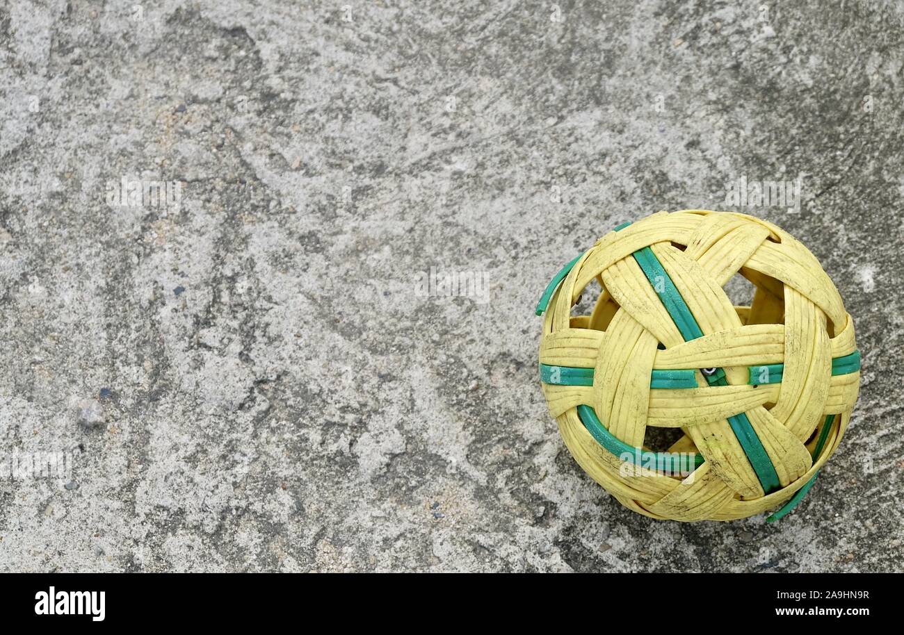 Traditional Sport of Thailand Rattan Ball or Takraw on Cement Floor ...