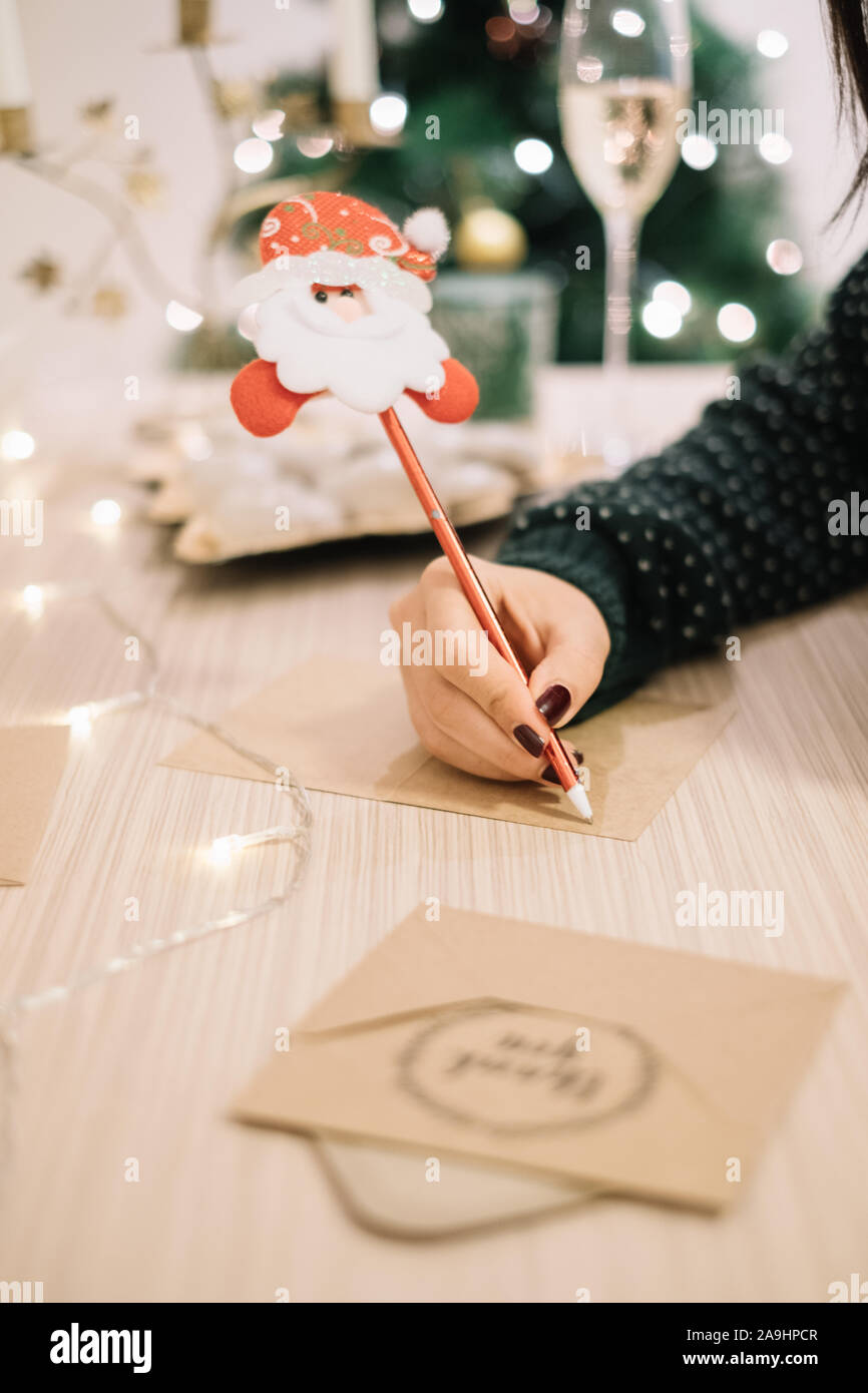 Womans hand decorating xmas tree hi-res stock photography and images ...