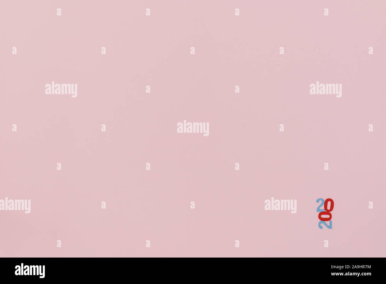 Logo of 2020 coming year in right lower corner on pink background. Copy ...