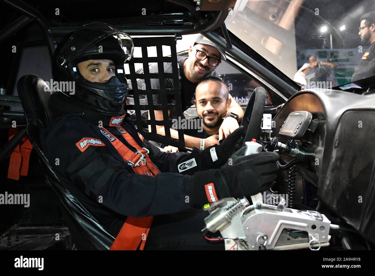 Kuwait City, Kuwait. 15th Nov, 2019. A driver (L) prepares before the ...
