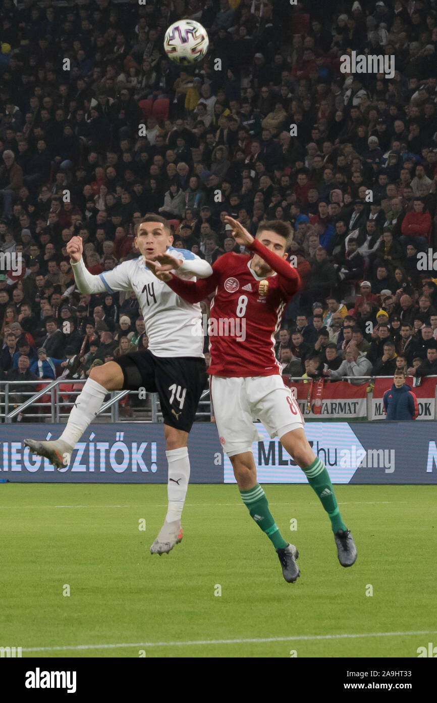 Budapest, Hungary. 15th Nov, 2019. Lucas Torreira (L) of Uruguay vies ...