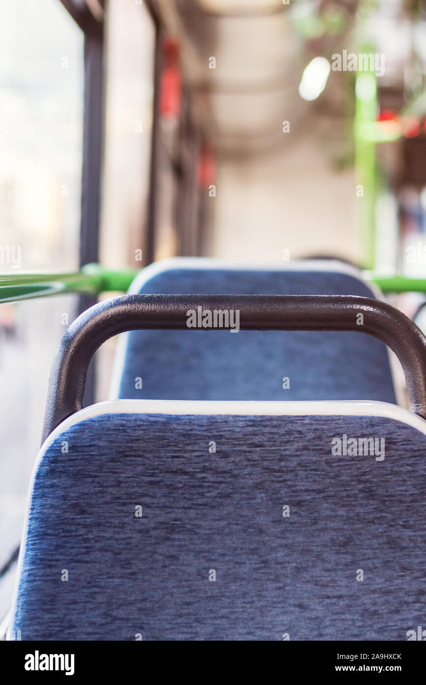 Seats in the city bus. Vertical composition Stock Photo - Alamy