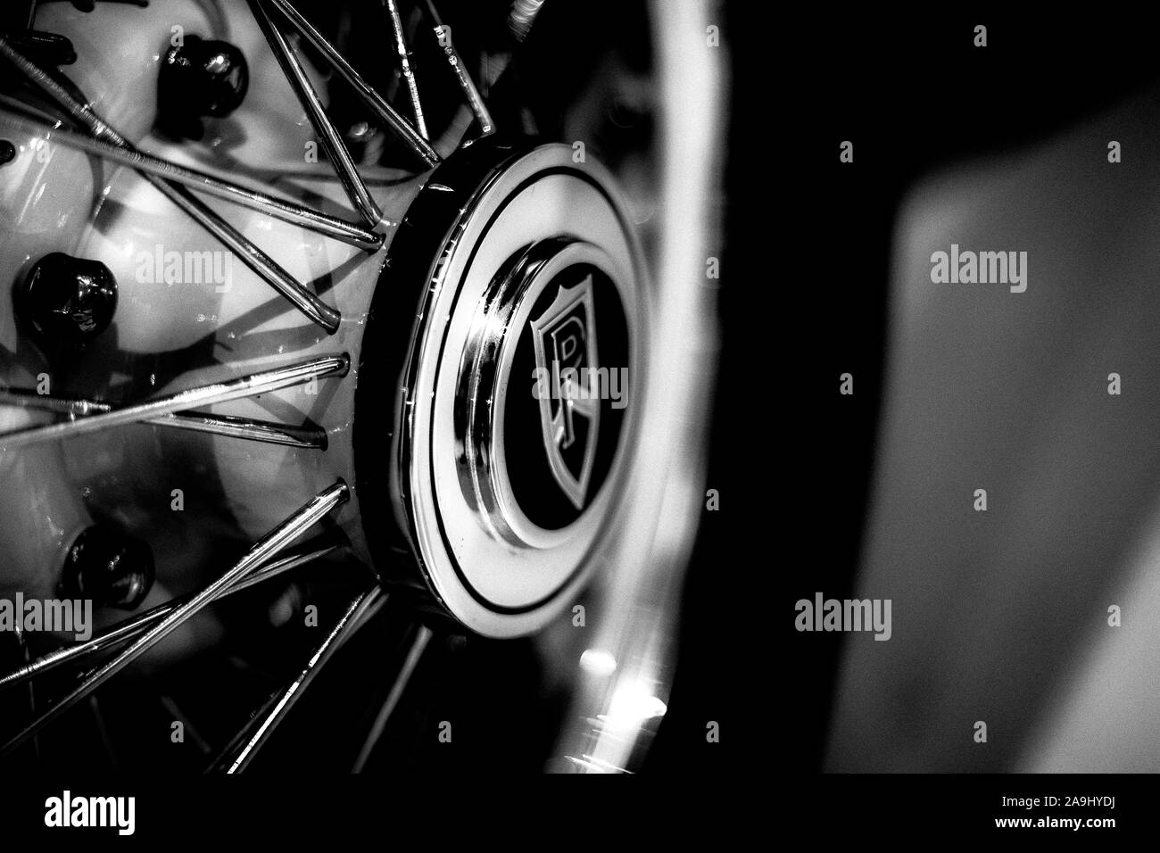 Black and white, Front view wheel with steel spokes and logo on wheel ...
