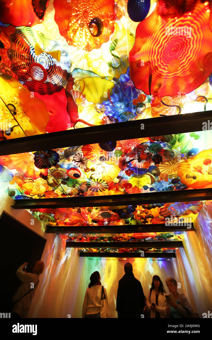 Beijing, USA. 14th Nov, 2019. People view glass artworks in Chihuly ...