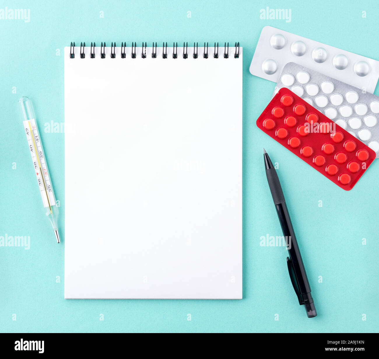 open notebook with blank white clean page to write the treatment plan ...