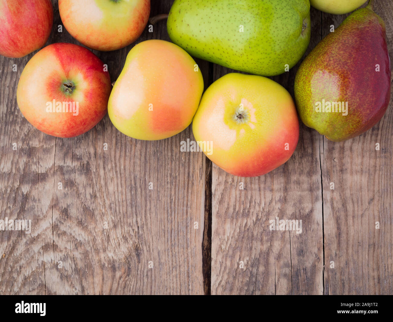 fruit set of pears and apples on wooden rustic table antique. The view ...