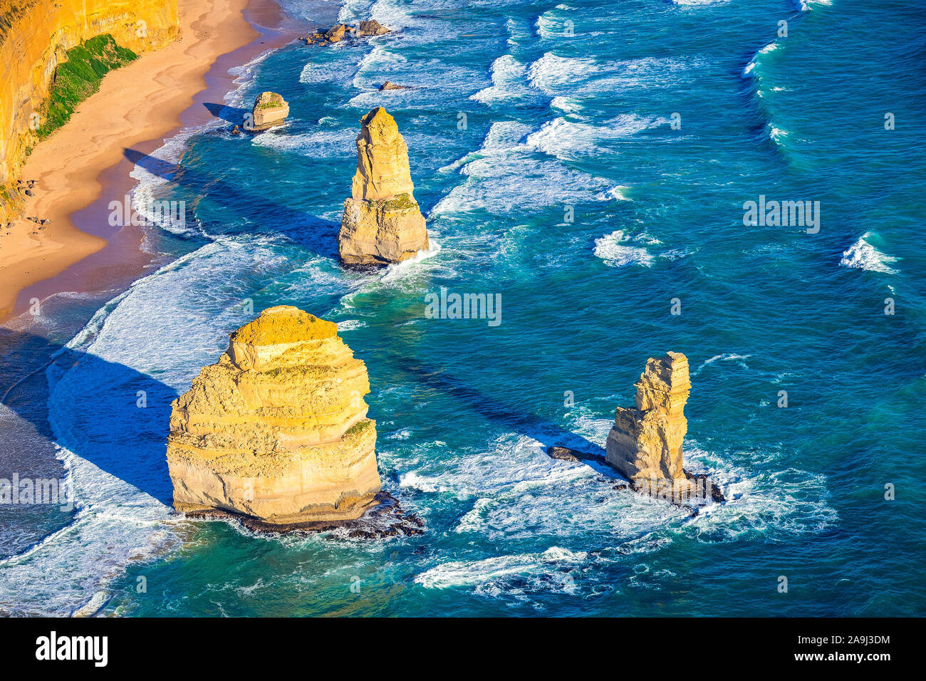 An aerial view of some of the rock stacks of the Twelve Apostles within ...