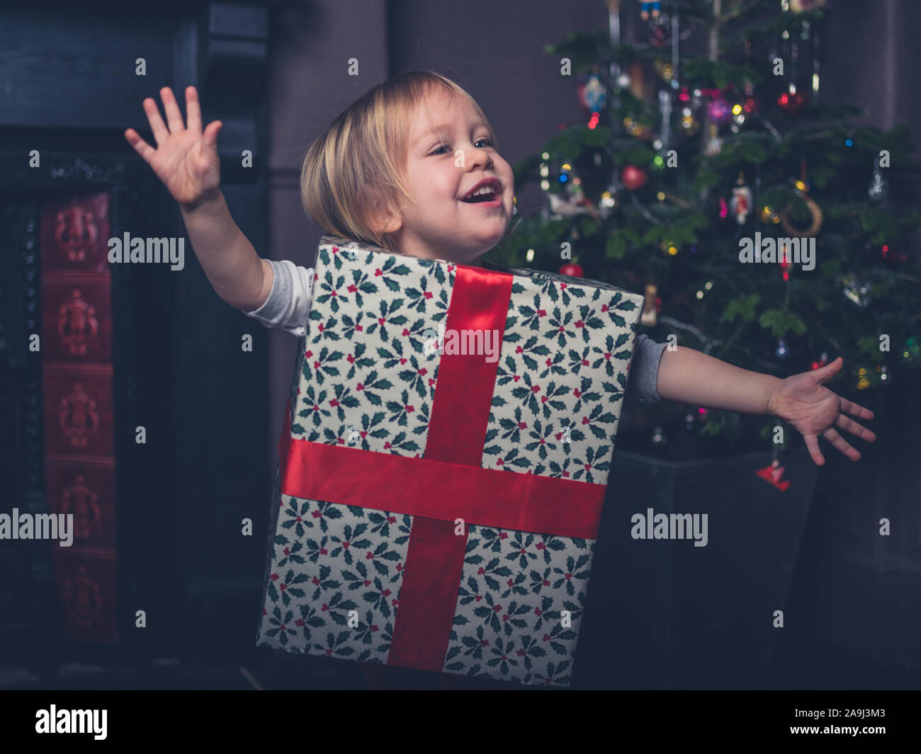 Happy girl dressed christmas hi-res stock photography and images - Alamy