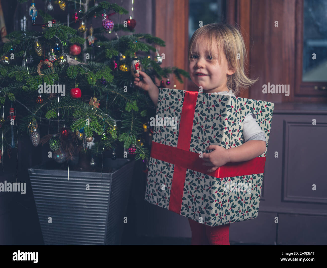 Unusual wrapped present hi-res stock photography and images - Alamy