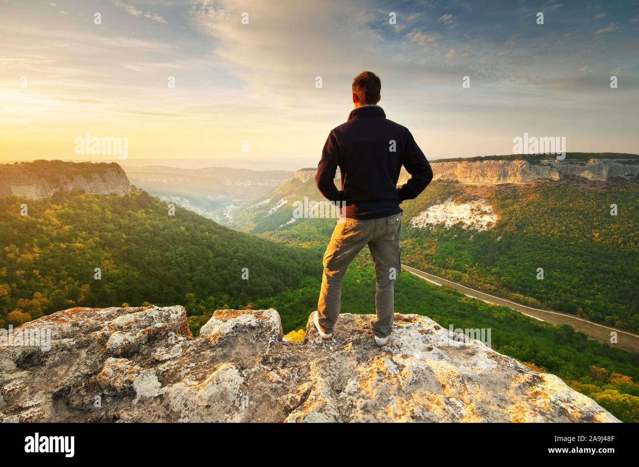 Man on top of mountain hi-res stock photography and images - Alamy