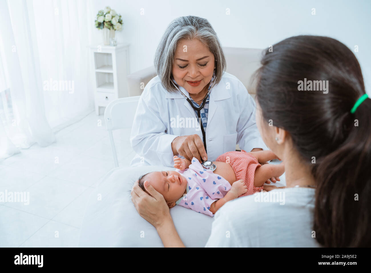 the doctor is immunizing a vaccine for baby Stock Photo - Alamy