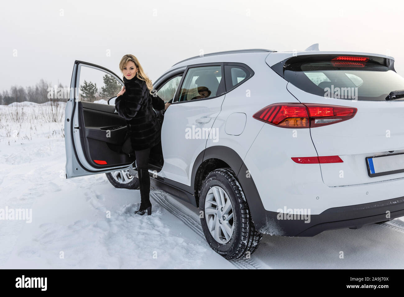 Stepping out of car hi-res stock photography and images - Alamy