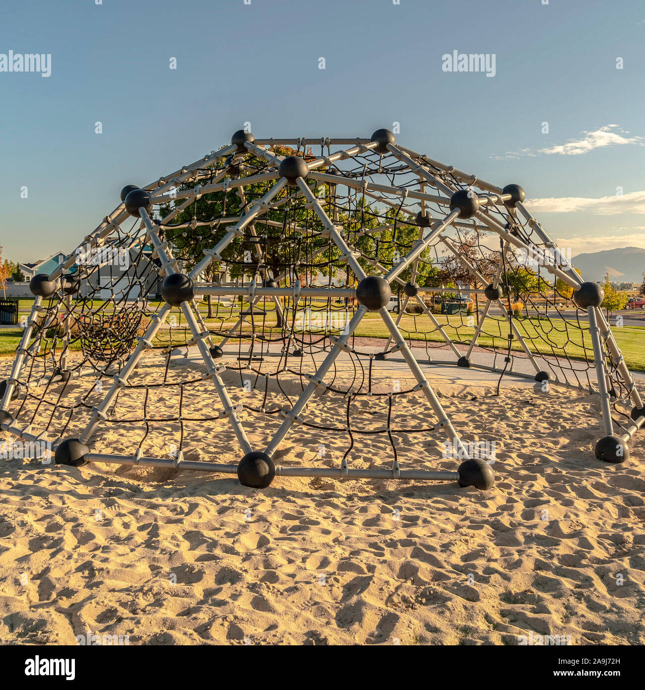 Square Metal climbing dome with nets in a playground Stock Photo - Alamy