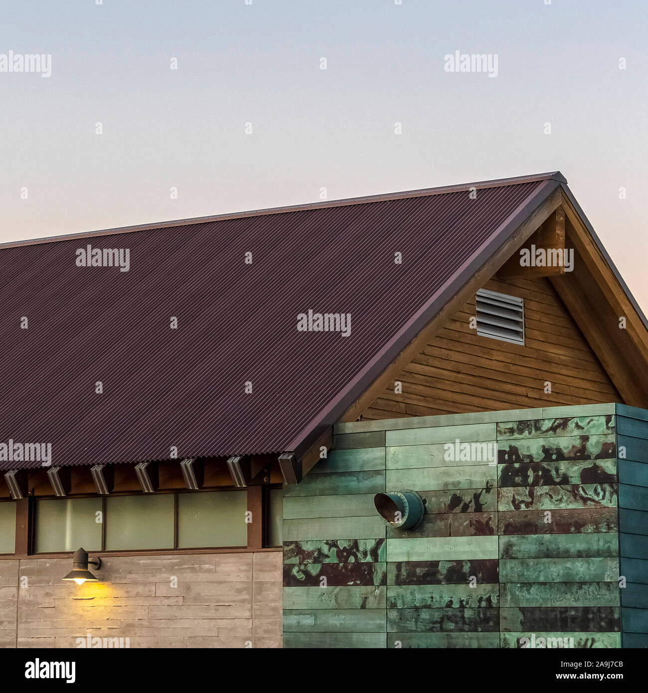 Square Building with gable roof and decorative wall Stock Photo - Alamy