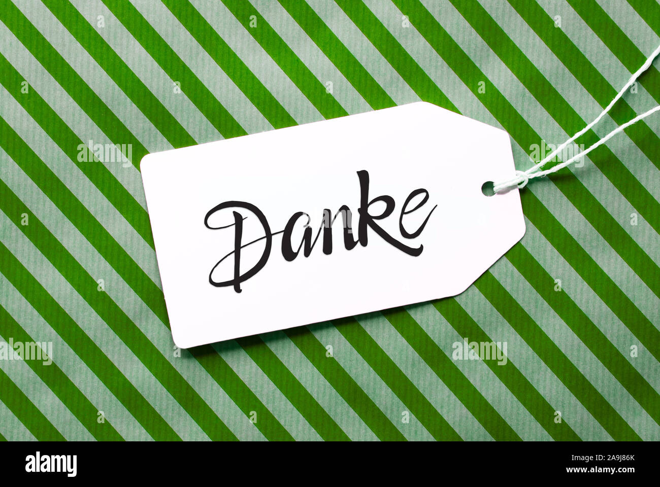 Green Wrapping Paper, Label, Danke Means Thank You Stock Photo - Alamy