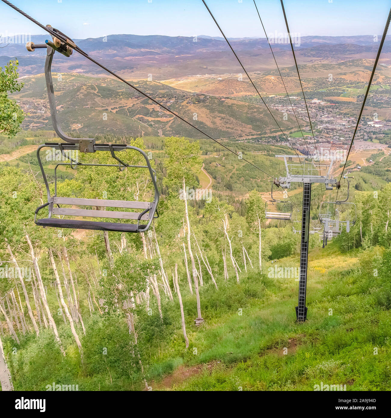 Square Hiking trails and chairlifts at a ski resort covered with ...