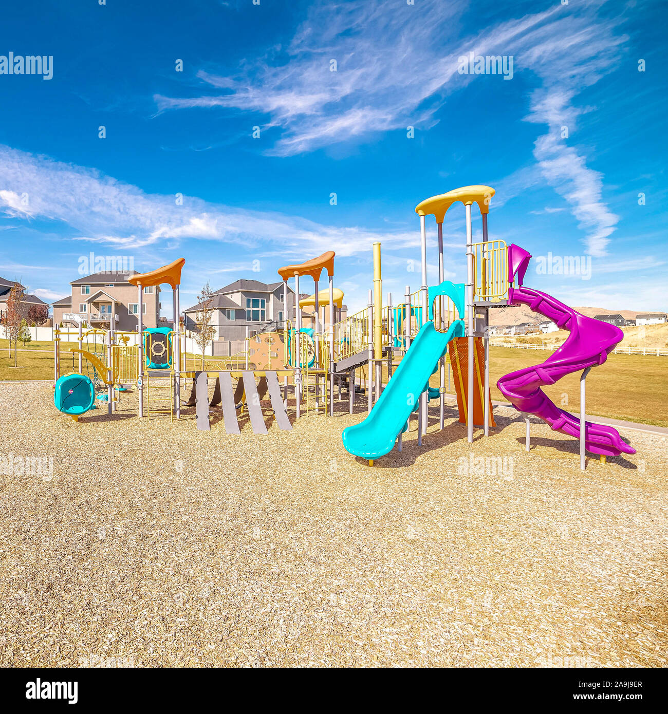 Square Kids entertainment area with slides and equipment Stock Photo ...