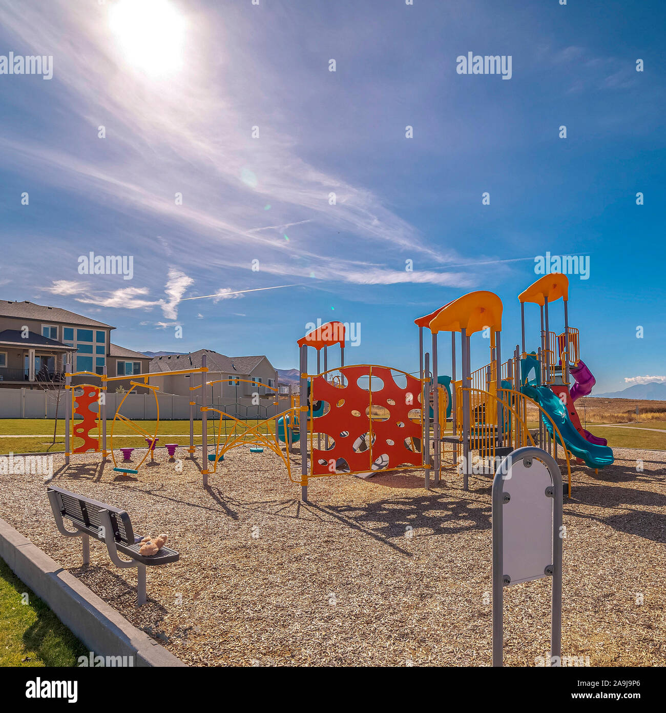 Square Corner perspective of a colorful kids playground Stock Photo - Alamy