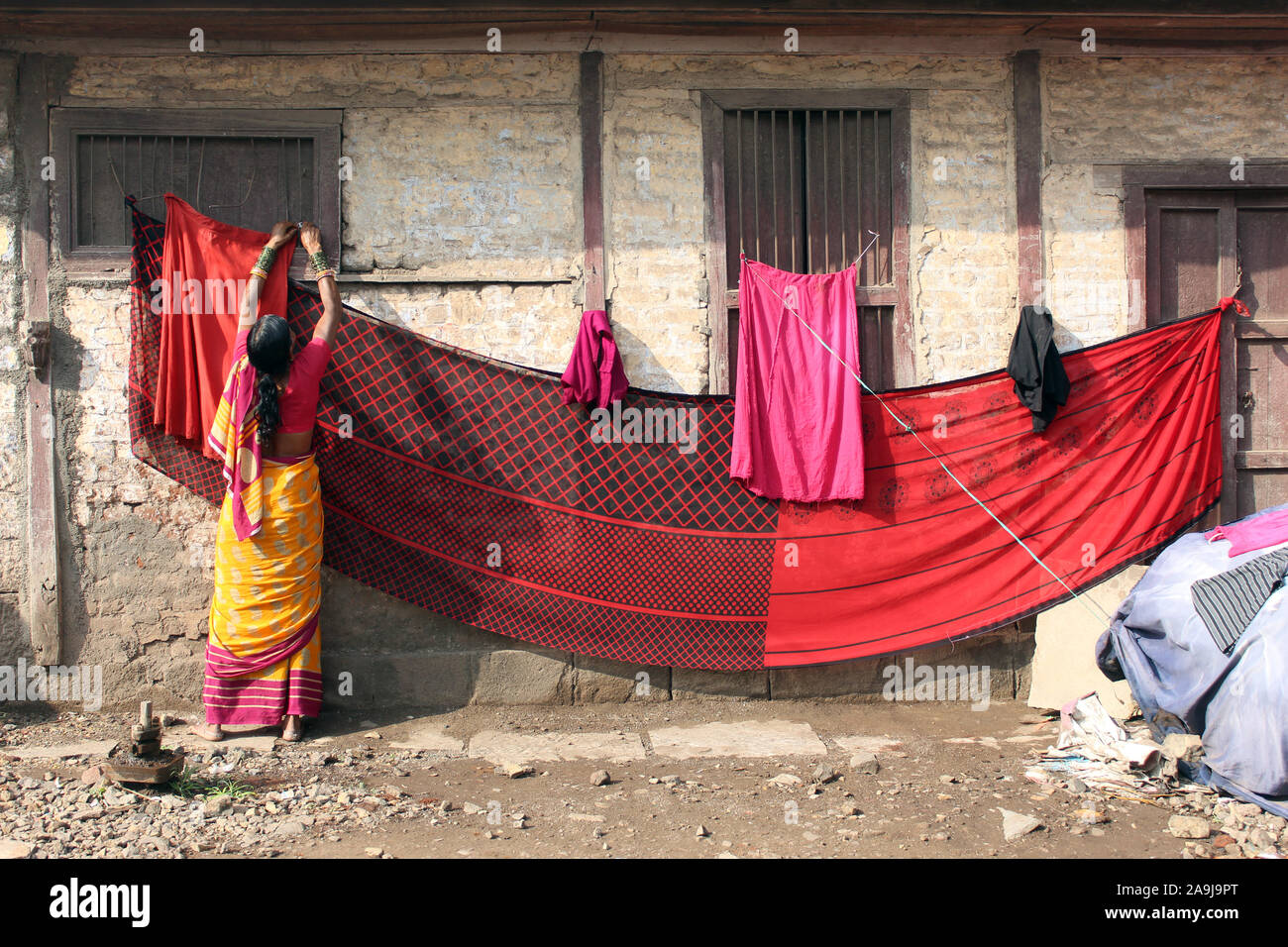 Woman drying clothing hi-res stock photography and images - Alamy